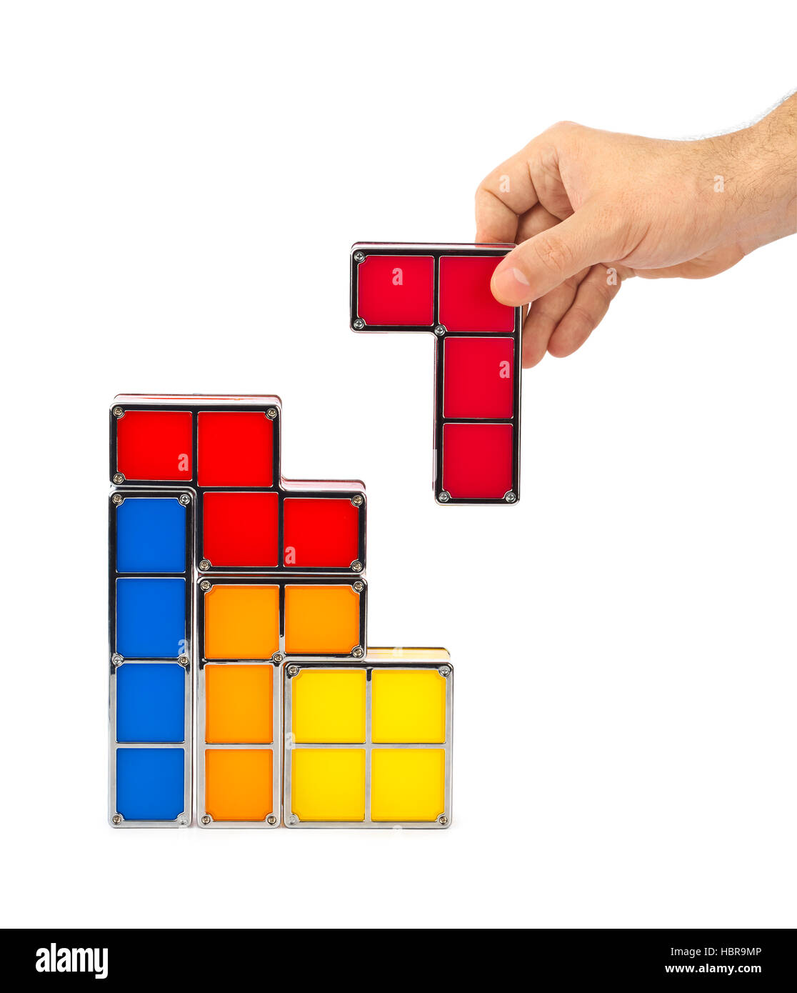 Toy blocks hand hi-res stock photography and images - Alamy