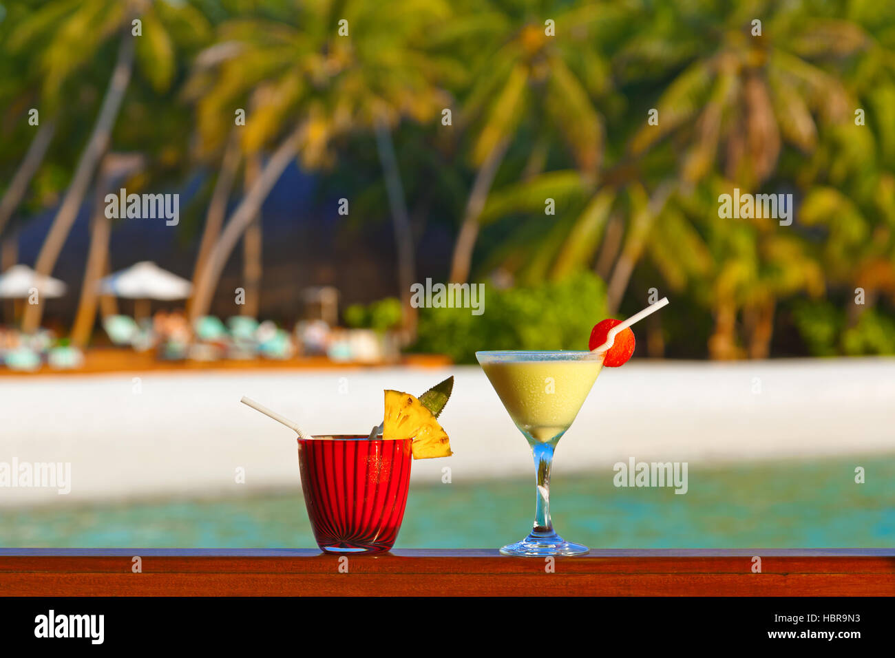 Fruit cocktail on Maldives beach Stock Photo - Alamy