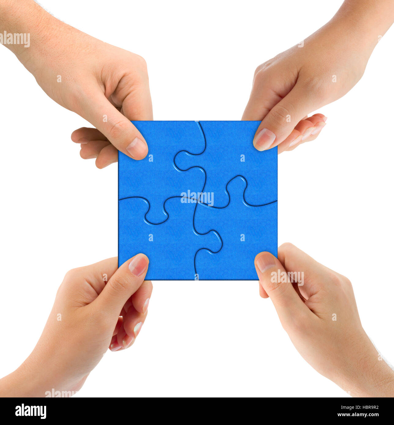 Four hands puzzle hi-res stock photography and images - Alamy
