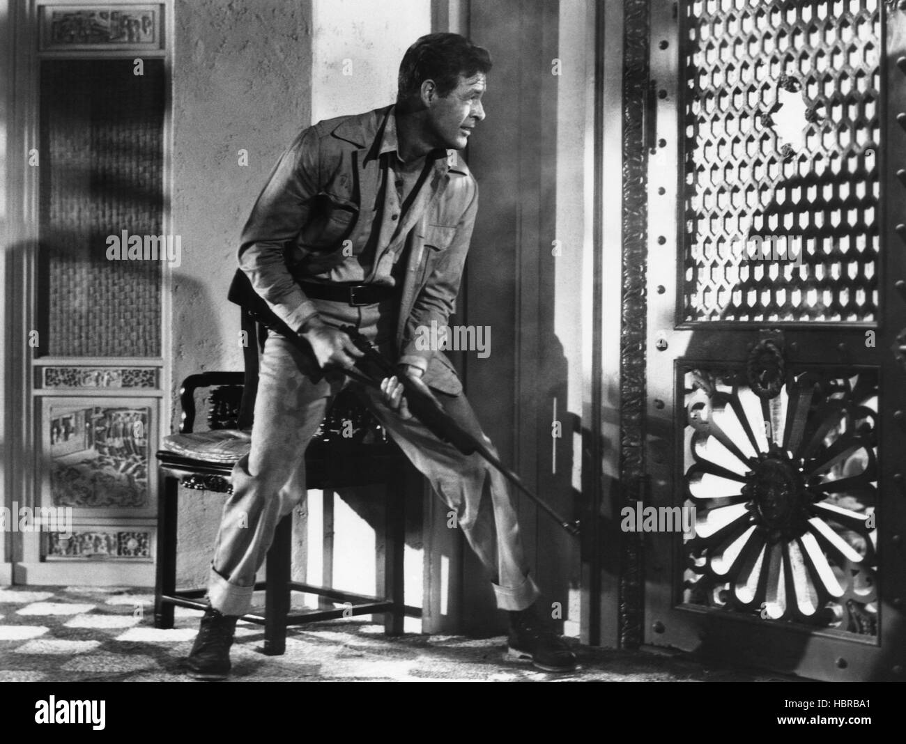ESCAPE TO BURMA, Robert Ryan, 1955 Stock Photo - Alamy
