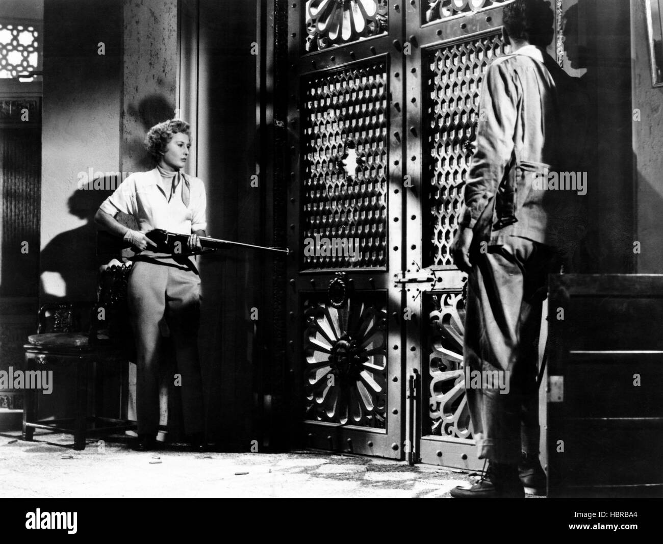ESCAPE TO BURMA, from left: Barbara Stanwyck, Robert Ryan, 1955 Stock ...