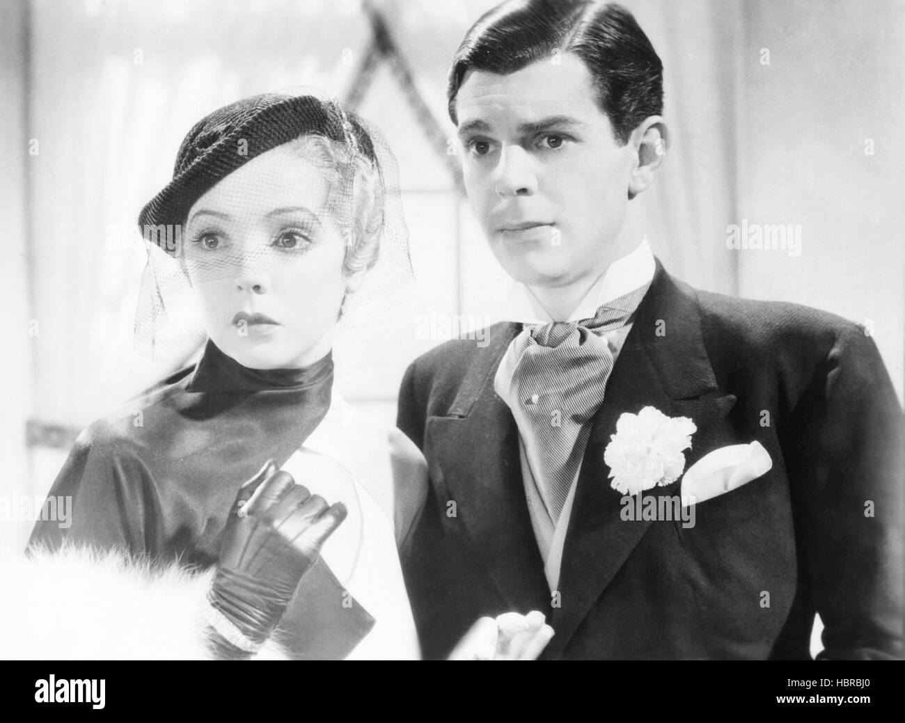 EVERGREEN, from left: Jessie Matthews, Barry MacKay, 1934 Stock Photo ...