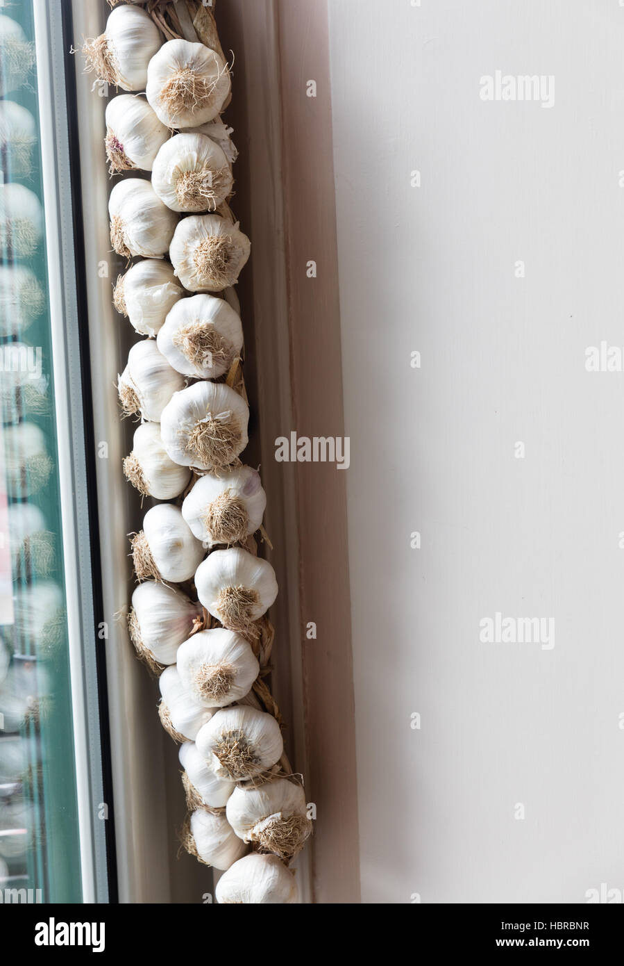 A garlic braid Stock Photo - Alamy