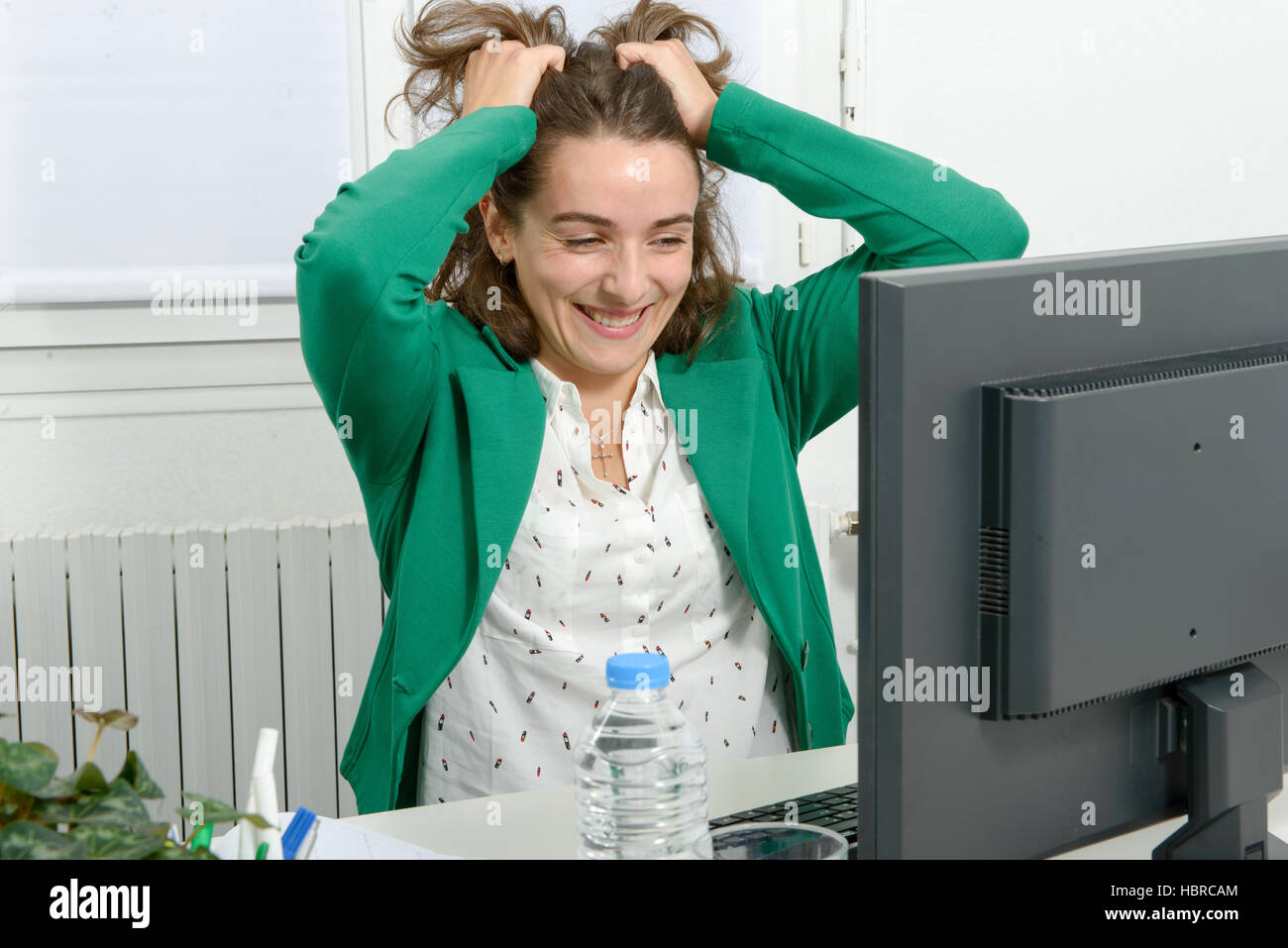 beautiful young business woman angry with her computer Stock Photo - Alamy