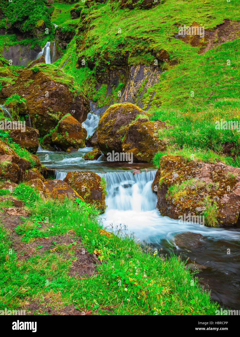 Waterfall from melting glacier Stock Photo - Alamy