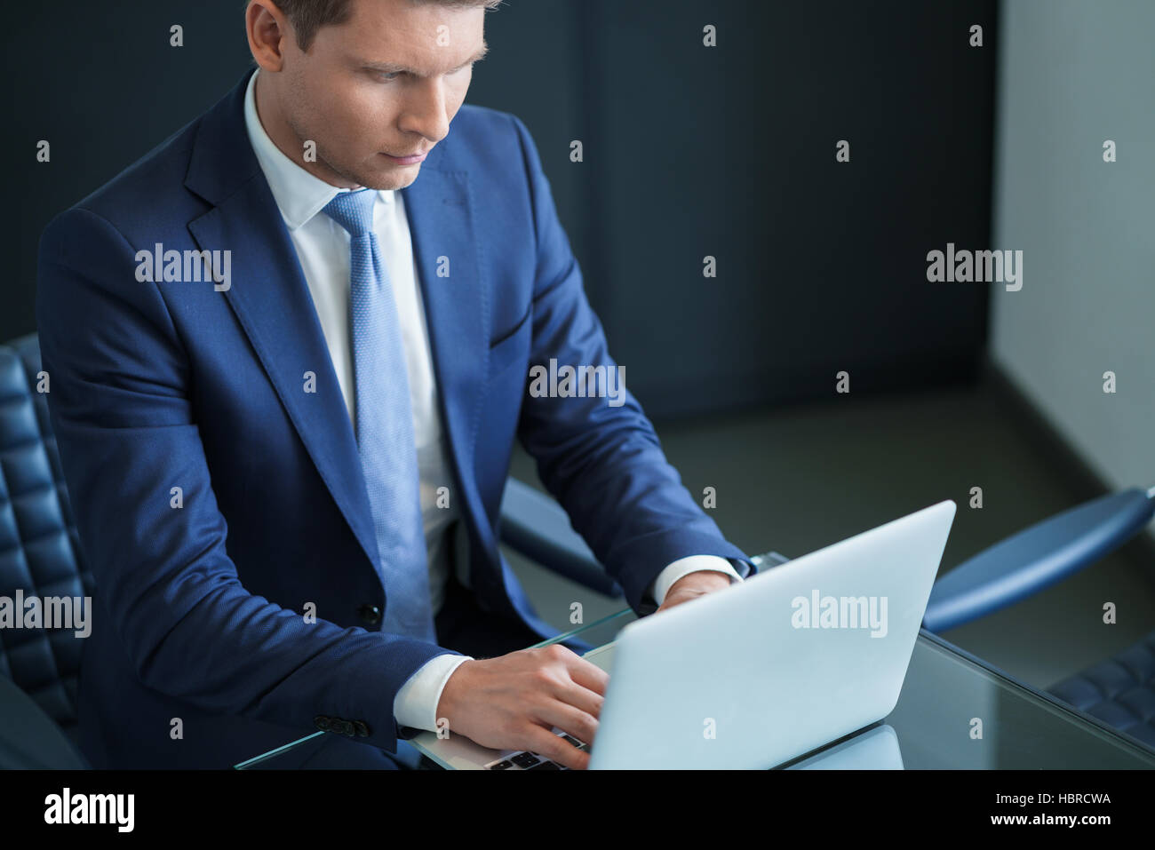 Single man working hi-res stock photography and images - Alamy