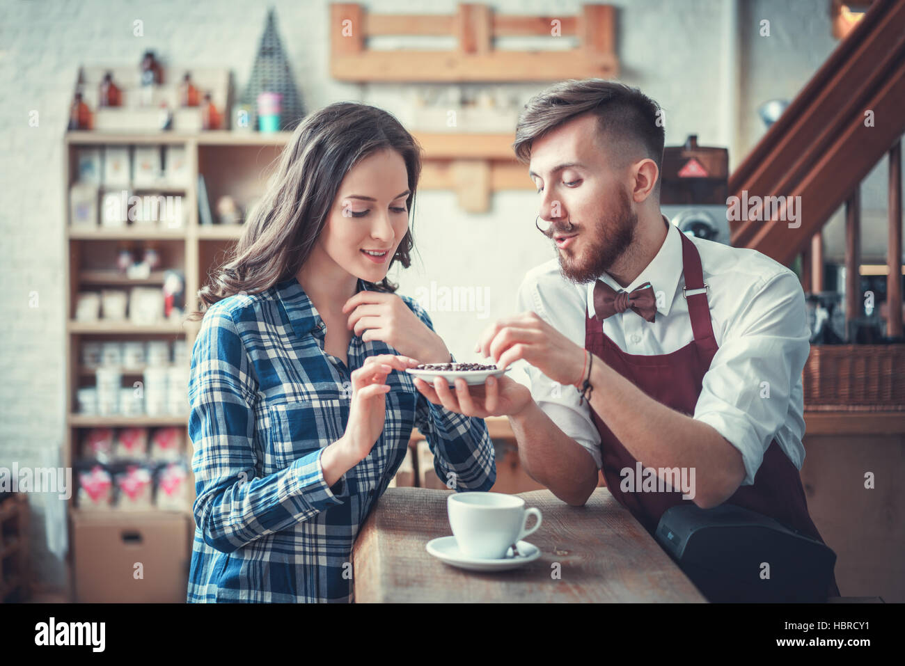 At the counter Stock Photo - Alamy