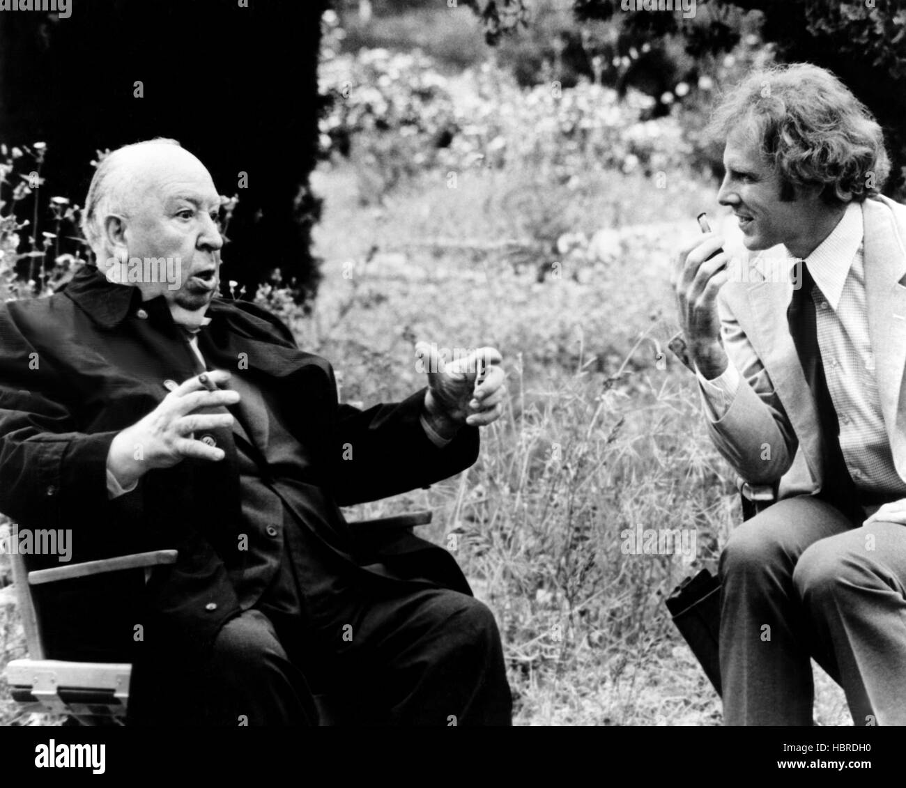 FAMILY PLOT, from left: director Alfred Hitchcock, Bruce Dern on set ...