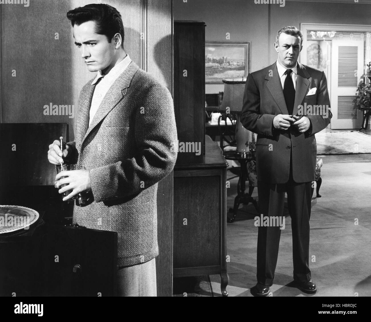 THE FAMILY SECRET, from left: John Derek, Lee J. Cobb, 1951 Stock Photo ...