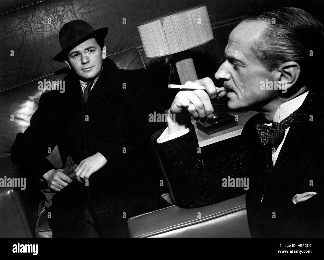 THE FALLEN SPARROW, John Garfield, Miles Mander, 1943 Stock Photo - Alamy