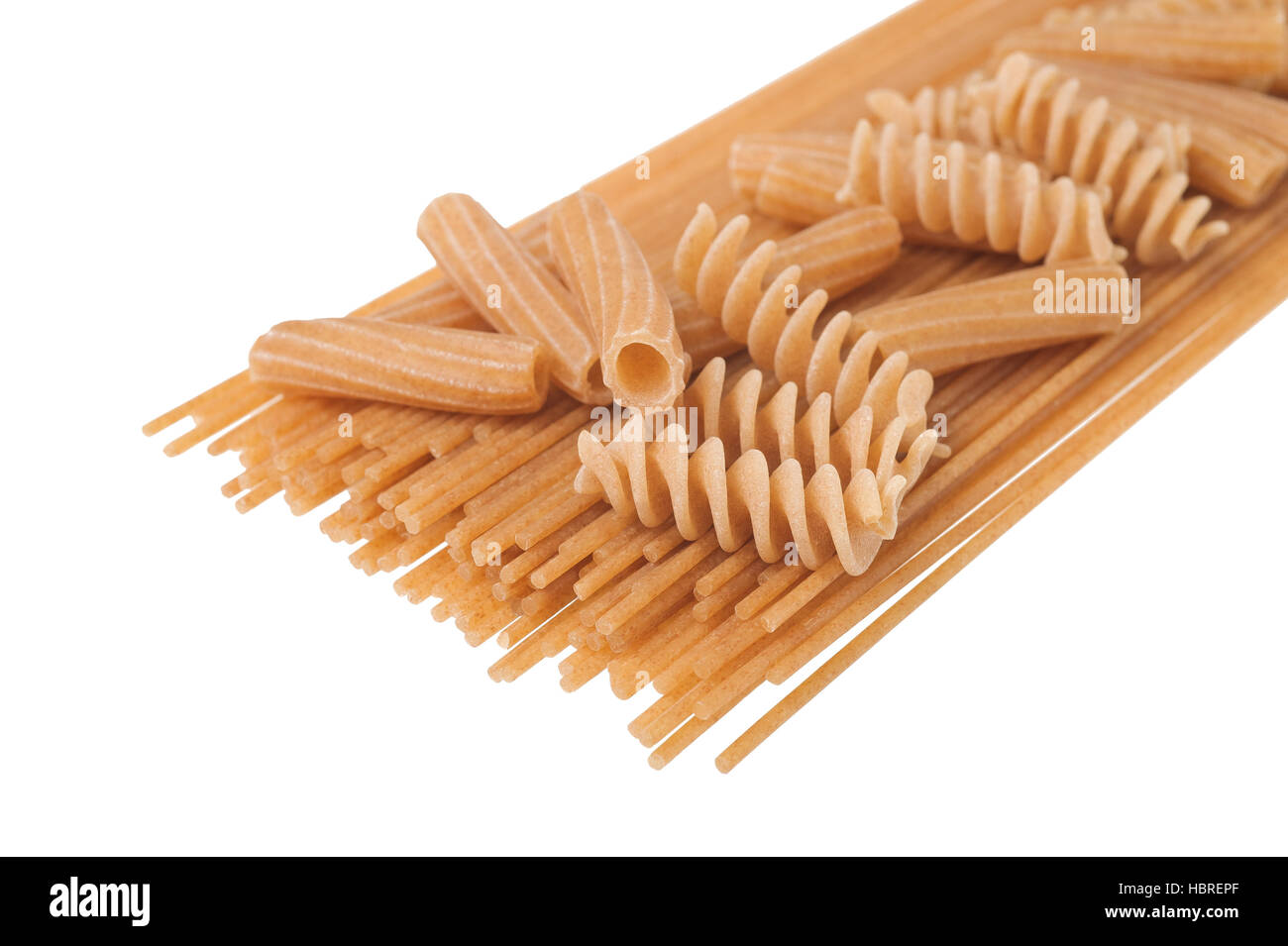 spaghetti, fusilli and maccheroni isolated on white Stock Photo - Alamy