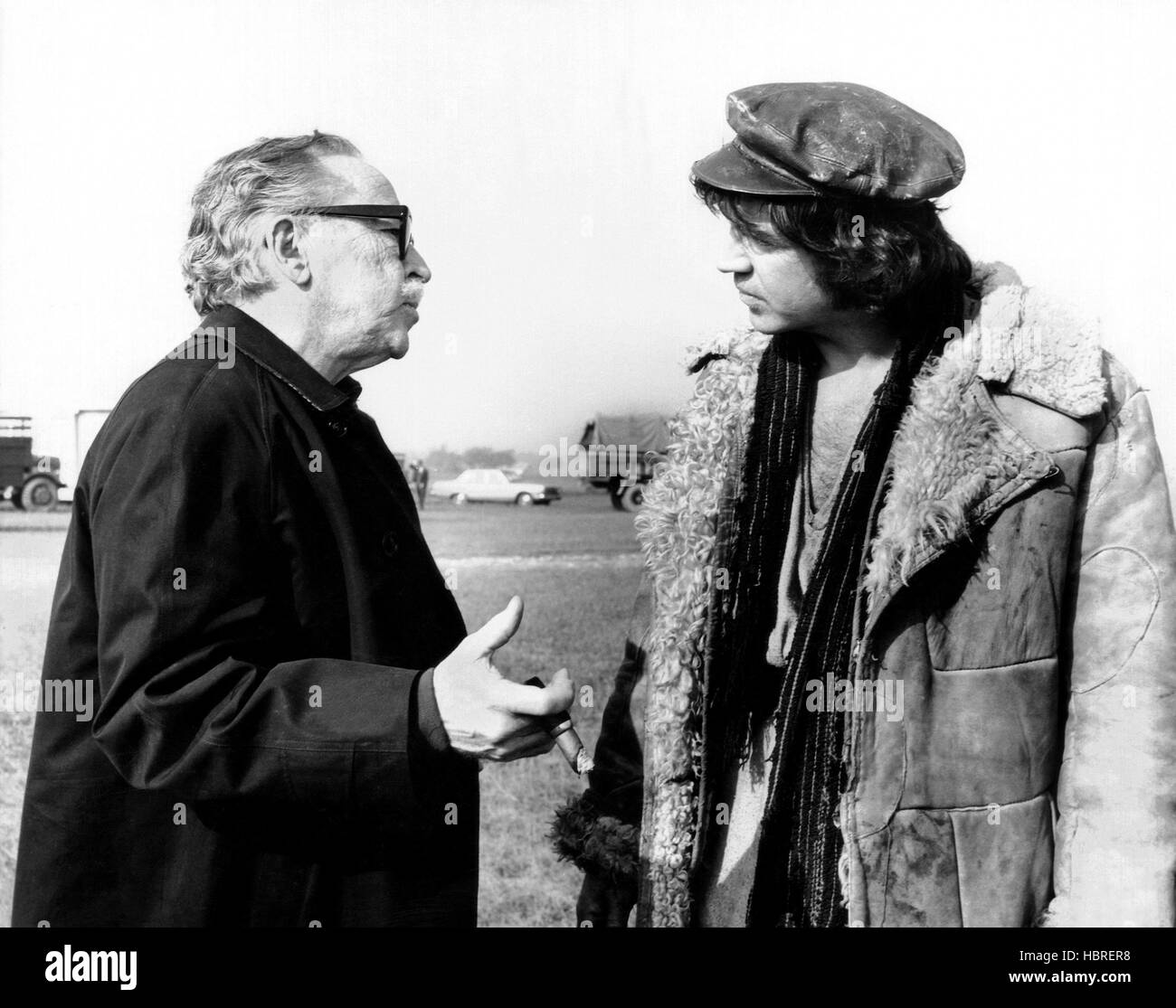 THE FIXER, from left, screenwriter Dalton Trumbo, Alan Bates, between ...