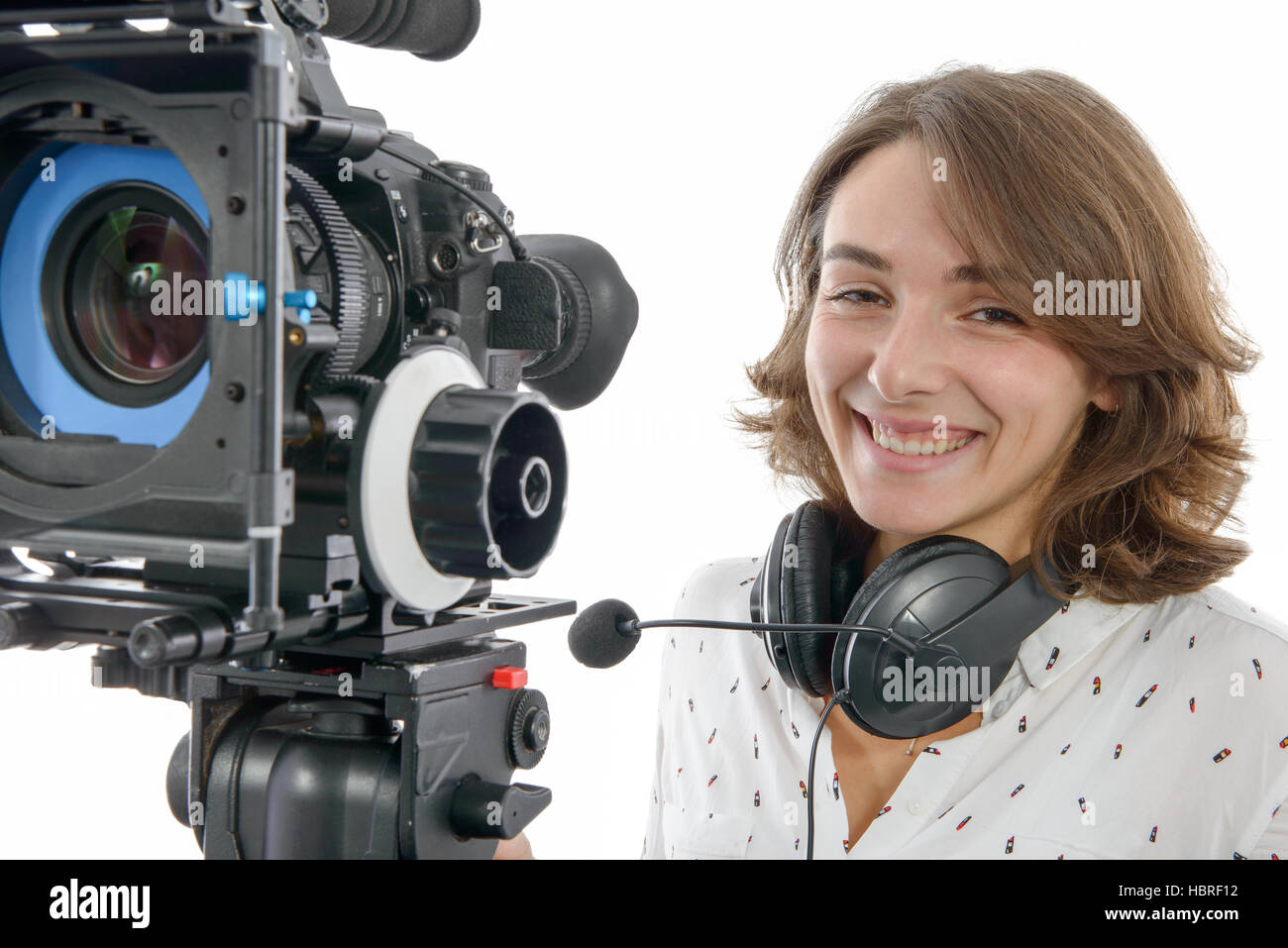 beautiful young woman with DSLR video camera and headphones Stock Photo ...