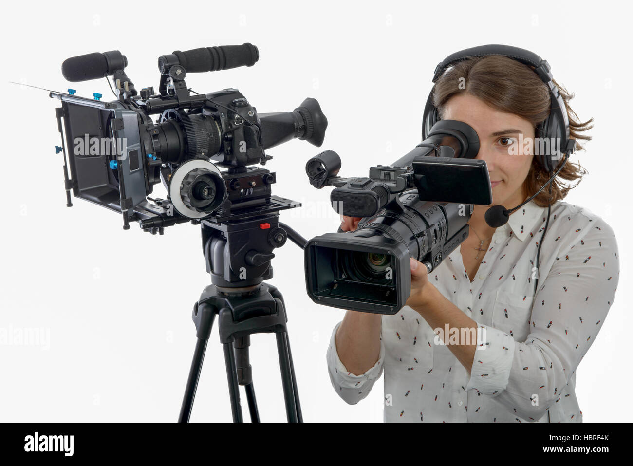Girl filming with camera Cut Out Stock Images & Pictures - Alamy