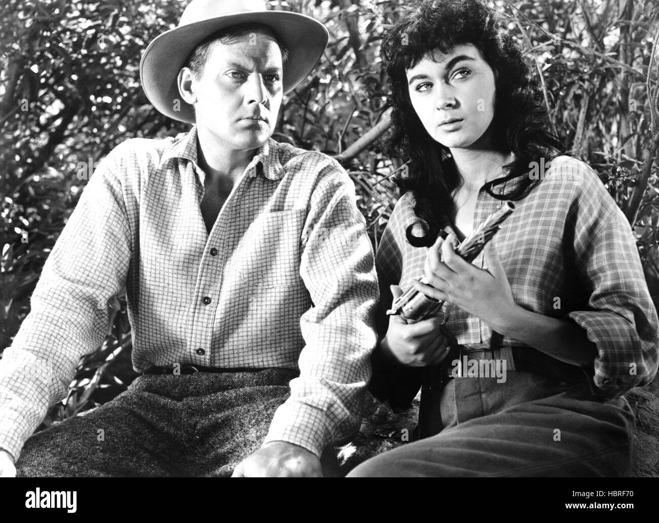 FLESH AND THE SPUR, from left: John Agar, Marla English, 1957 Stock Photo - Alamy