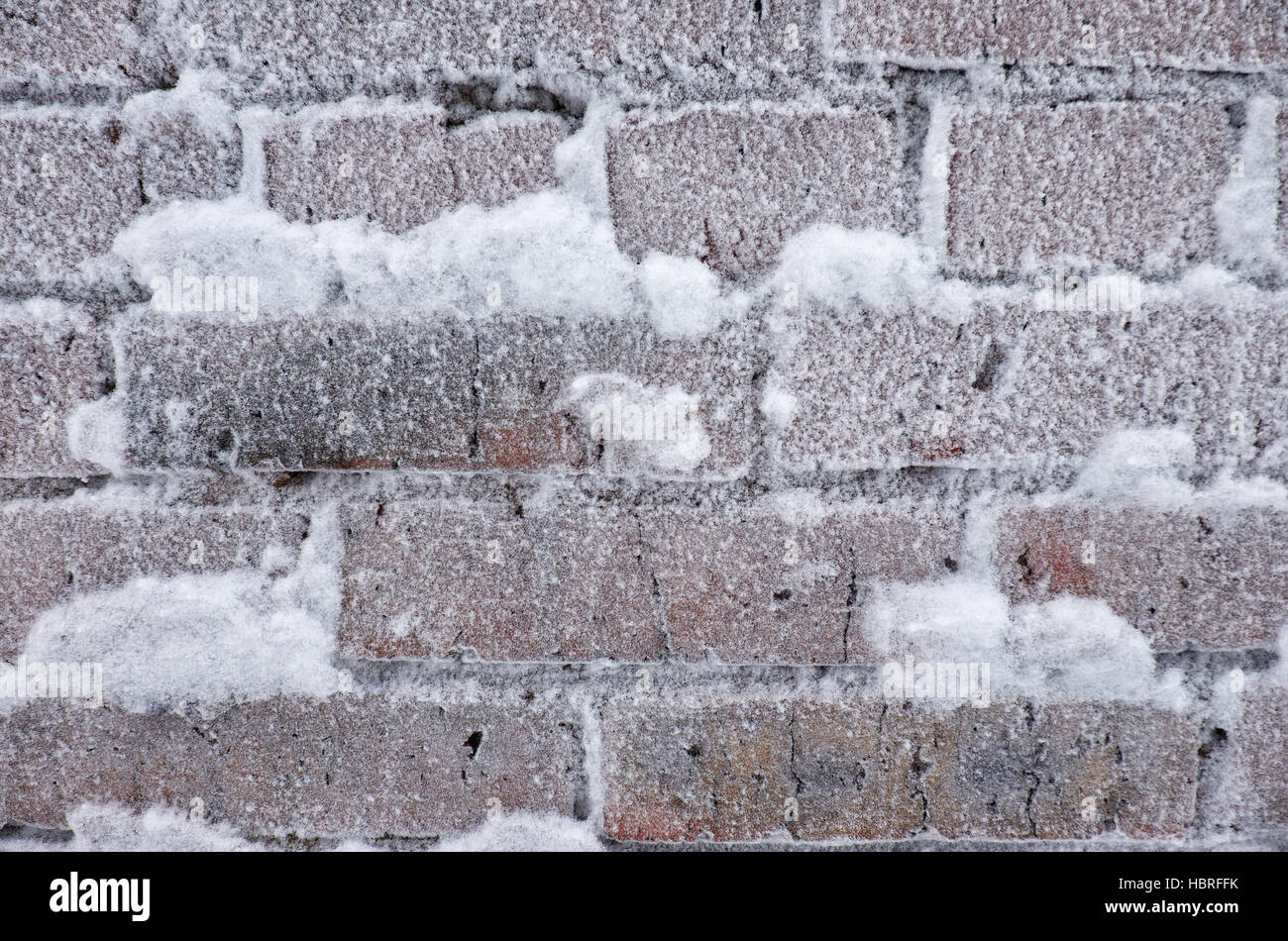 Frozen brick wall covered by hoarfrost Stock Photo - Alamy