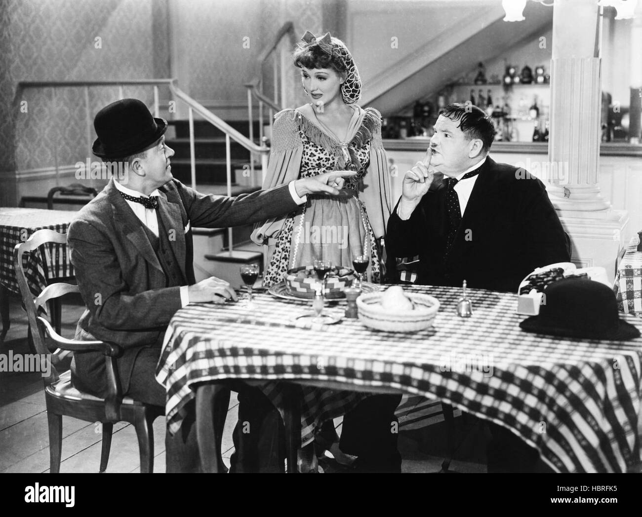 THE FLYING DEUCES, from left, Stan Laurel, Jean Parker, Oliver Hardy ...
