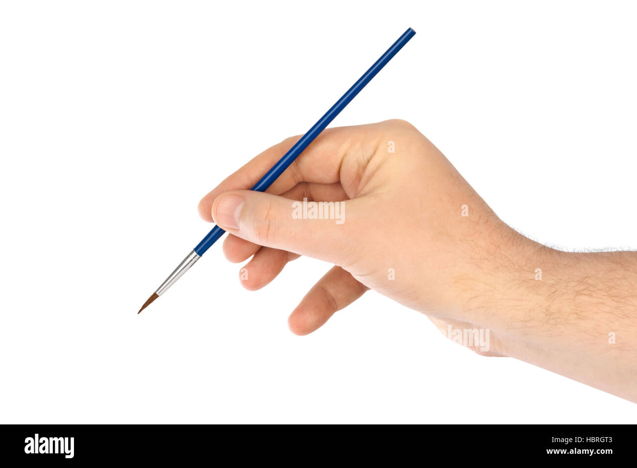 Hand holding brush brushing Cut Out Stock Images & Pictures - Alamy