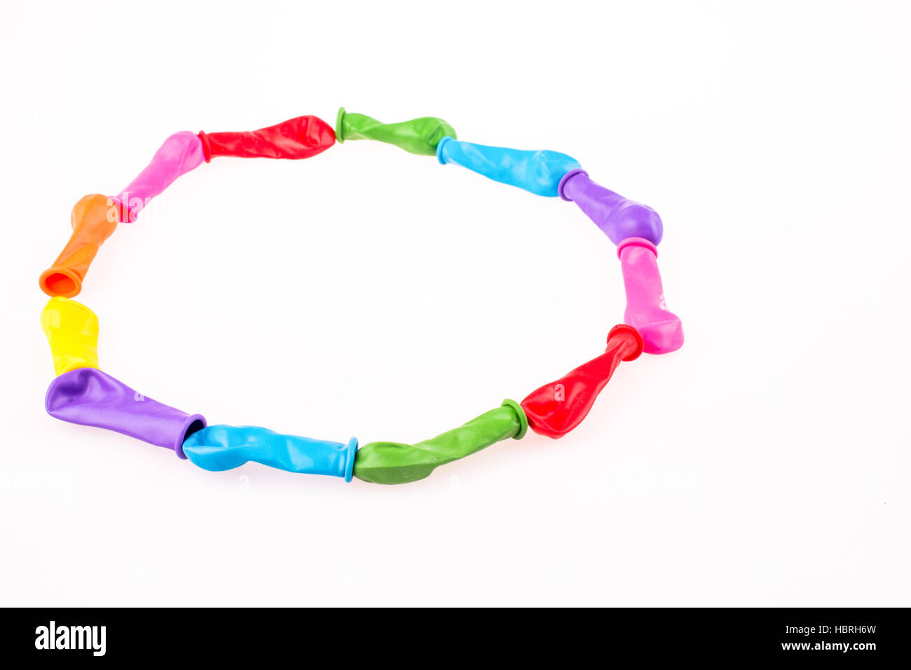 Little balloons of various color form a circle shape Stock Photo - Alamy