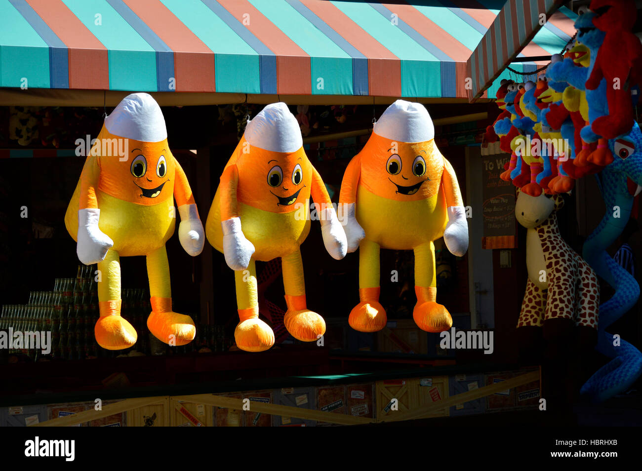 Row of soft toy prizes on a stall Stock Photo - Alamy