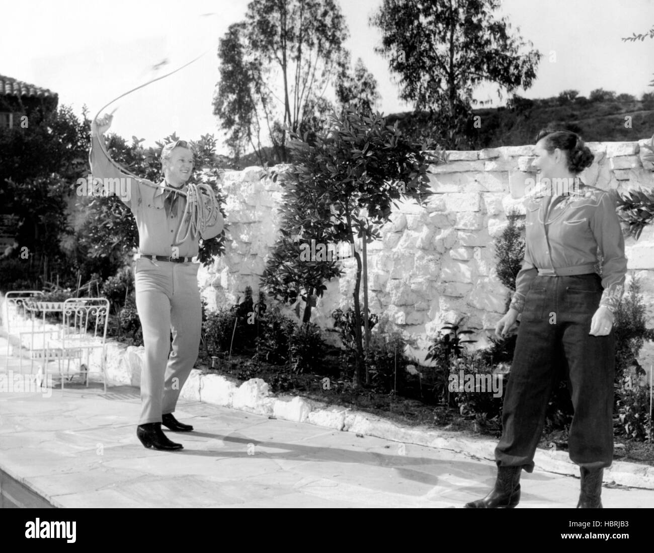 FORT WORTH, David Brian, left, practices his lariat work with his wife ...