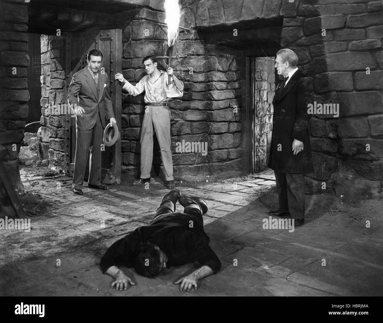 FRANKENSTEIN, John Boles, Colin Clive, Boris Karloff, (on floor ...