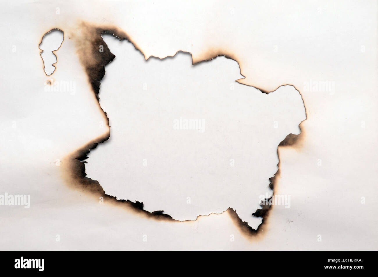 Burnt hole hi-res stock photography and images - Alamy