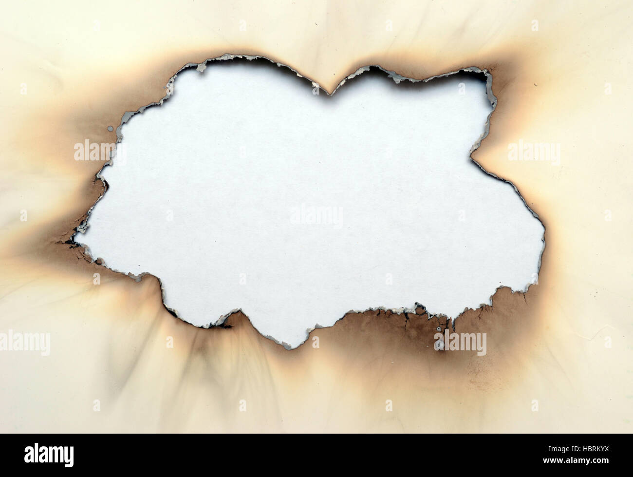 Burnt hole hi-res stock photography and images - Alamy