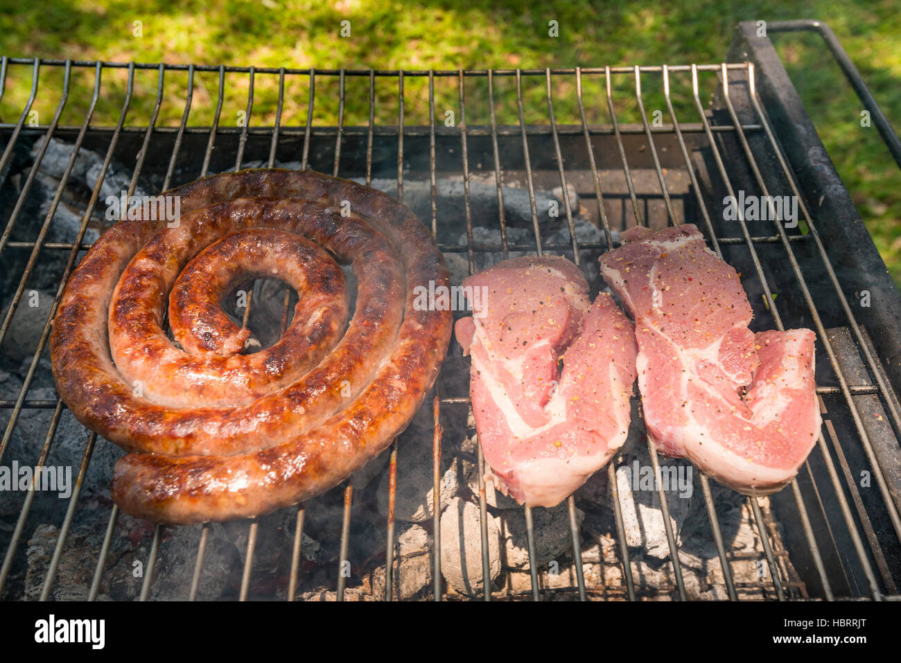 braai barbeque Africa Zimbabwe flame grilled meat Stock Photo - Alamy
