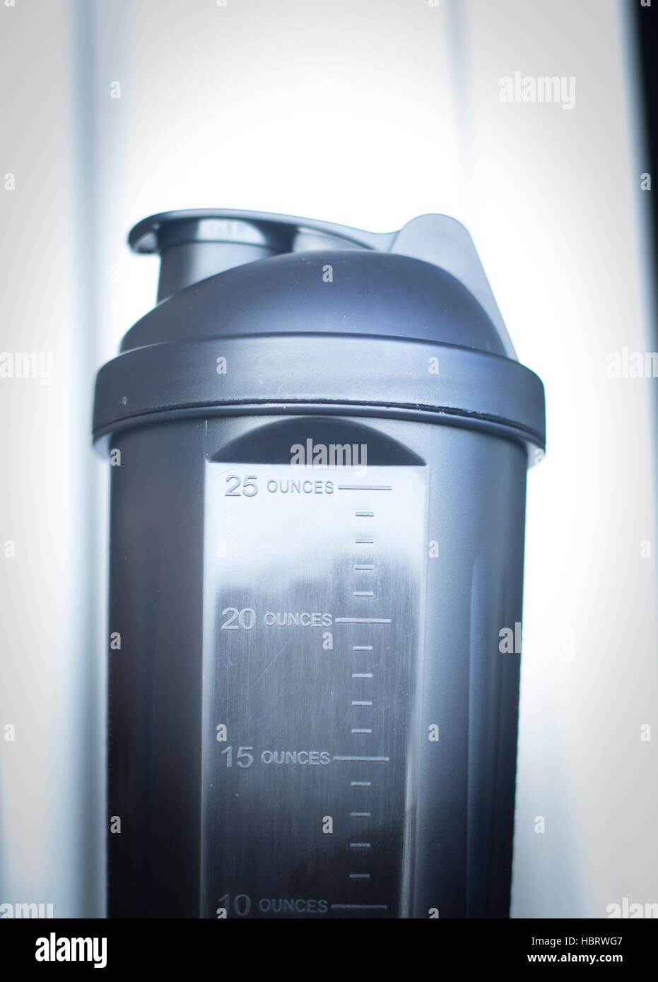 Protein shake shaker used to mix whey powder, glutamine, creatine and ...
