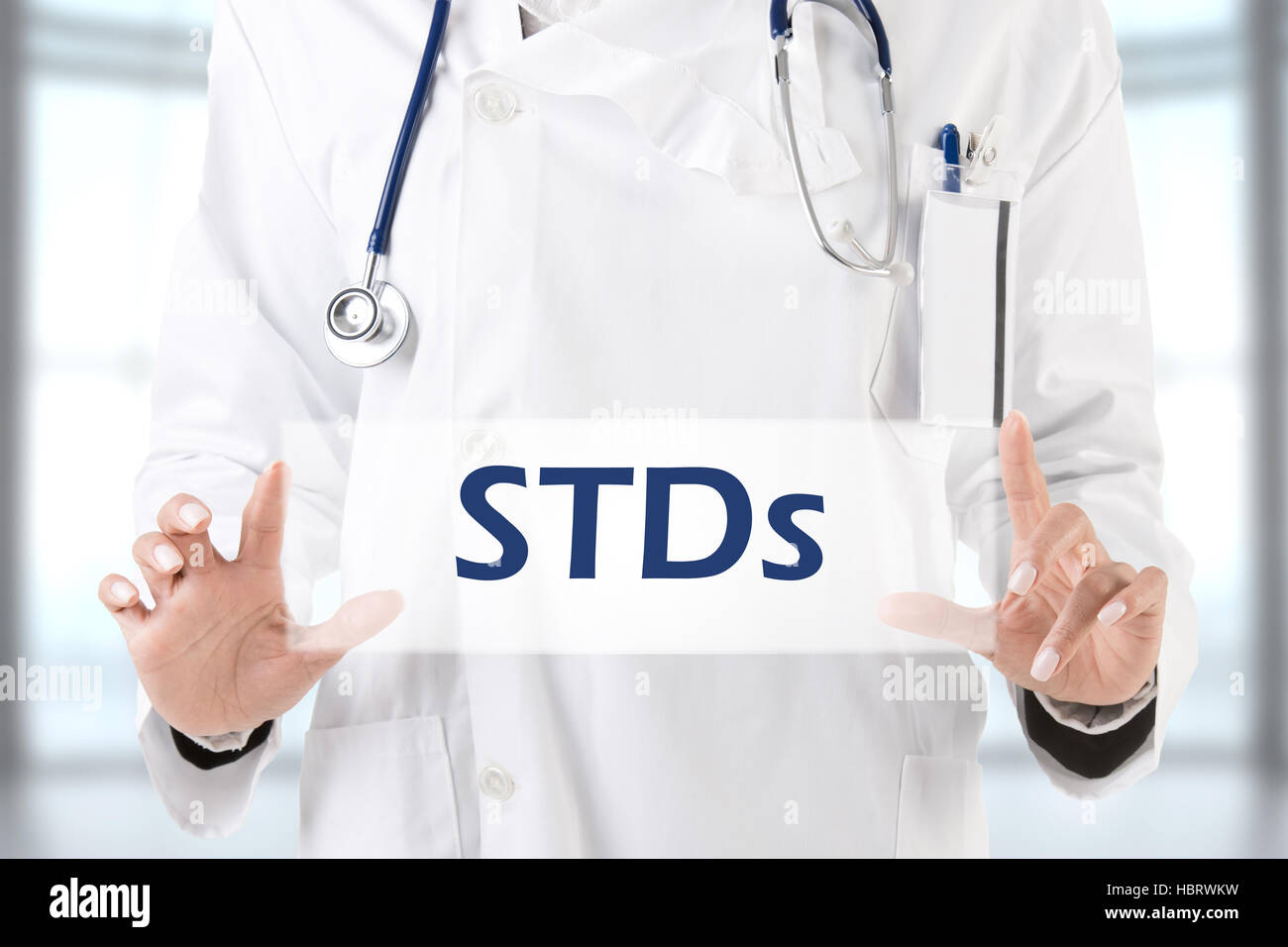 Female Doctor Holding Sign Stock Photo - Alamy