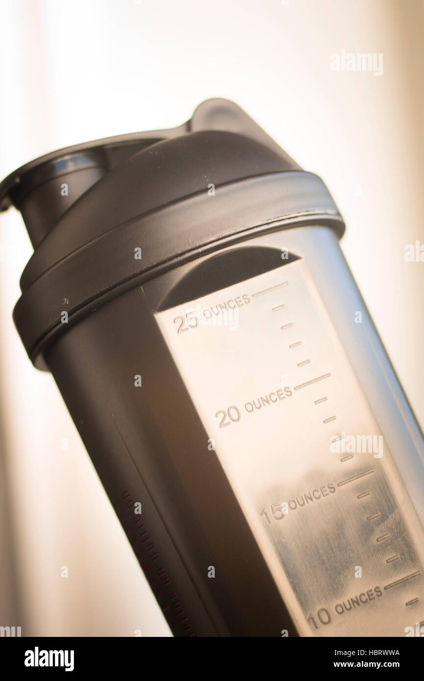 Protein shake shaker used to mix whey powder, glutamine, creatine and ...