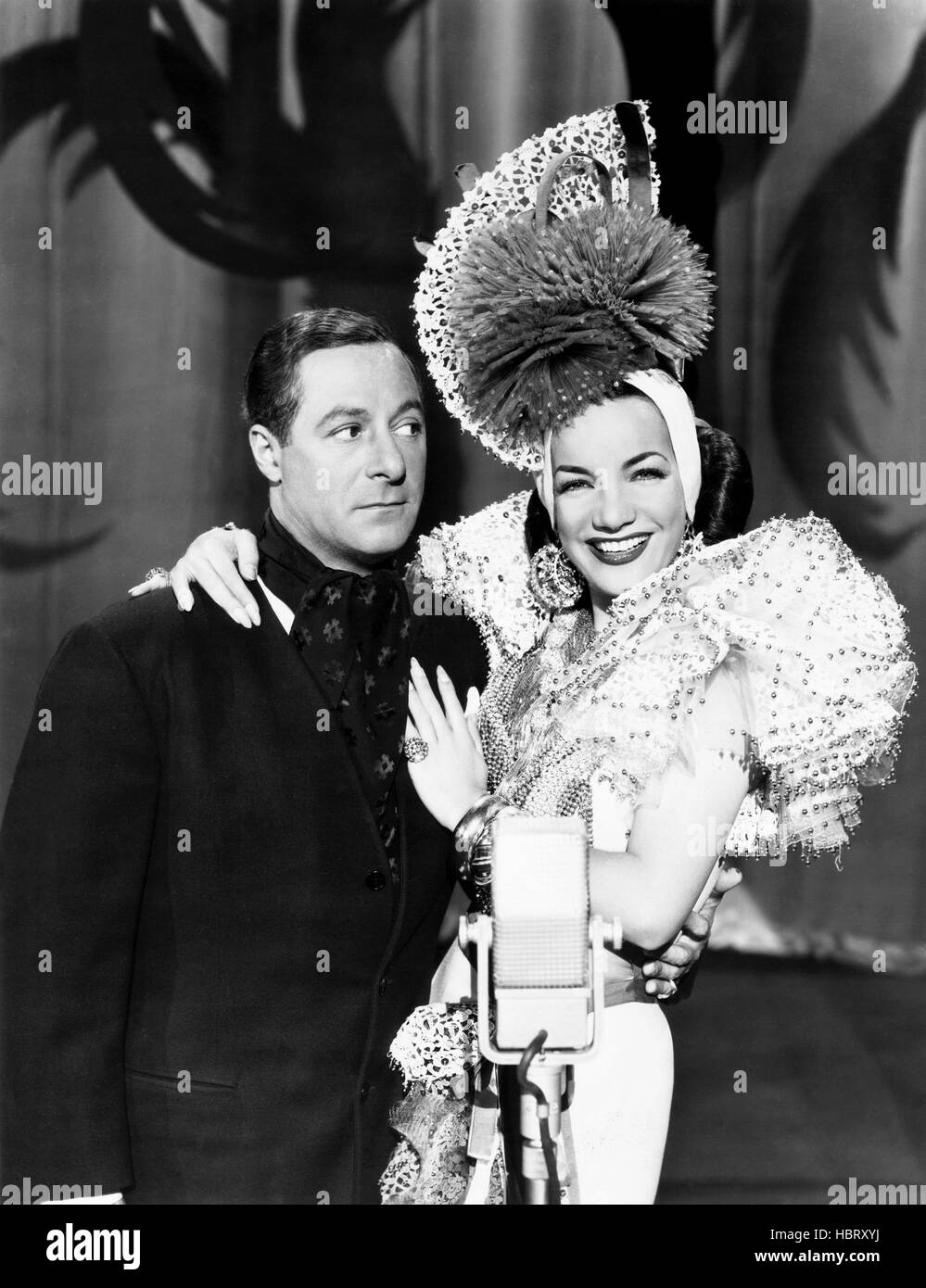 FOUR JILLS IN A JEEP, from left, George Jessel, Carmen Miranda, 1944 ...
