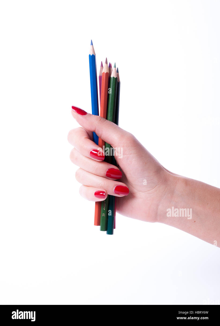 Woman hand holding pencils Stock Photo - Alamy