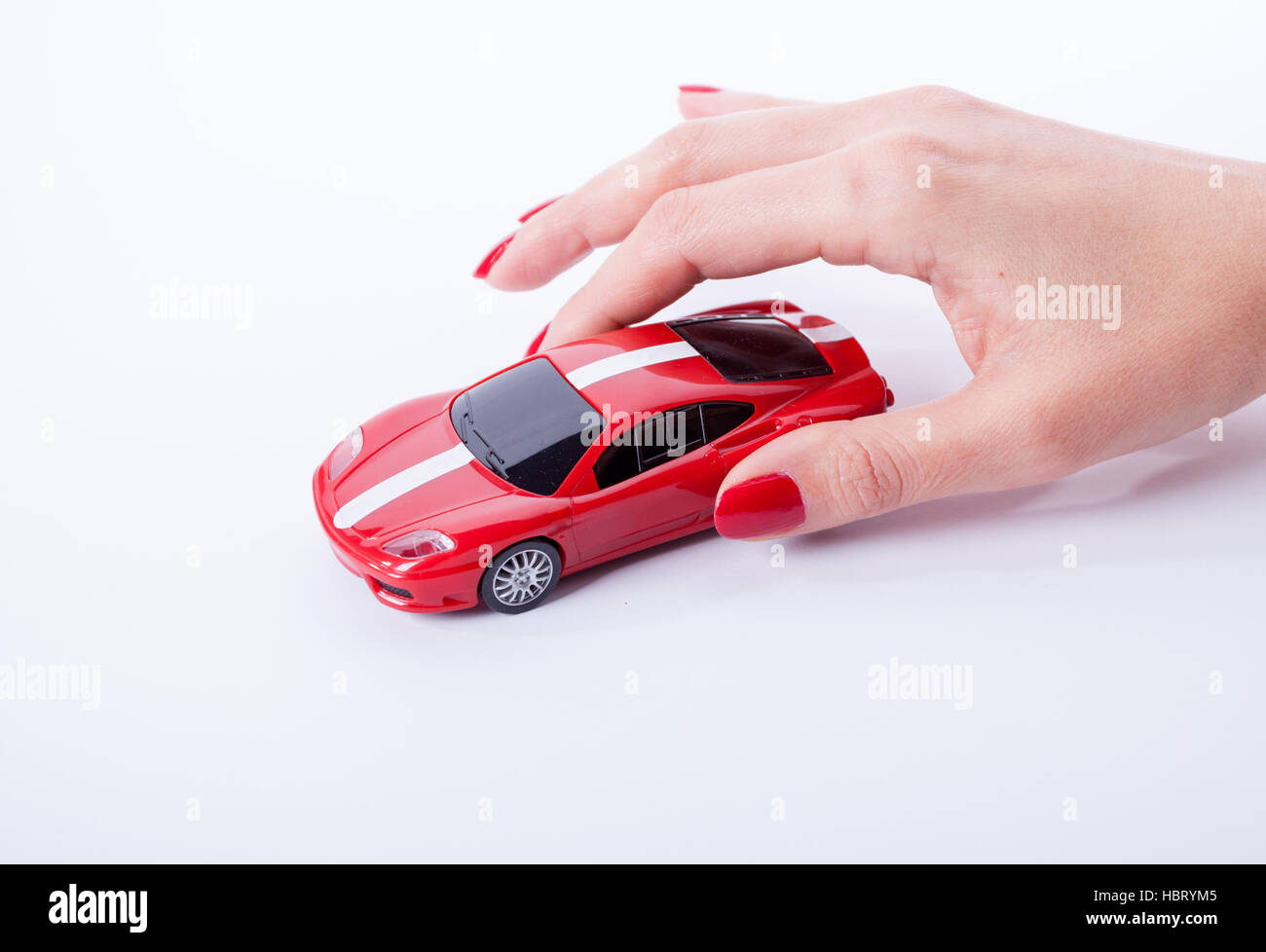 Hand with a car Stock Photo - Alamy