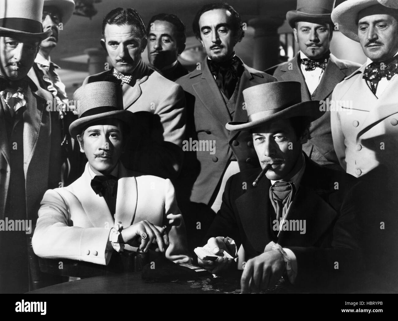 THE FOXES OF HARROW, from left, front, Richard Haydn, Rex Harrison ...