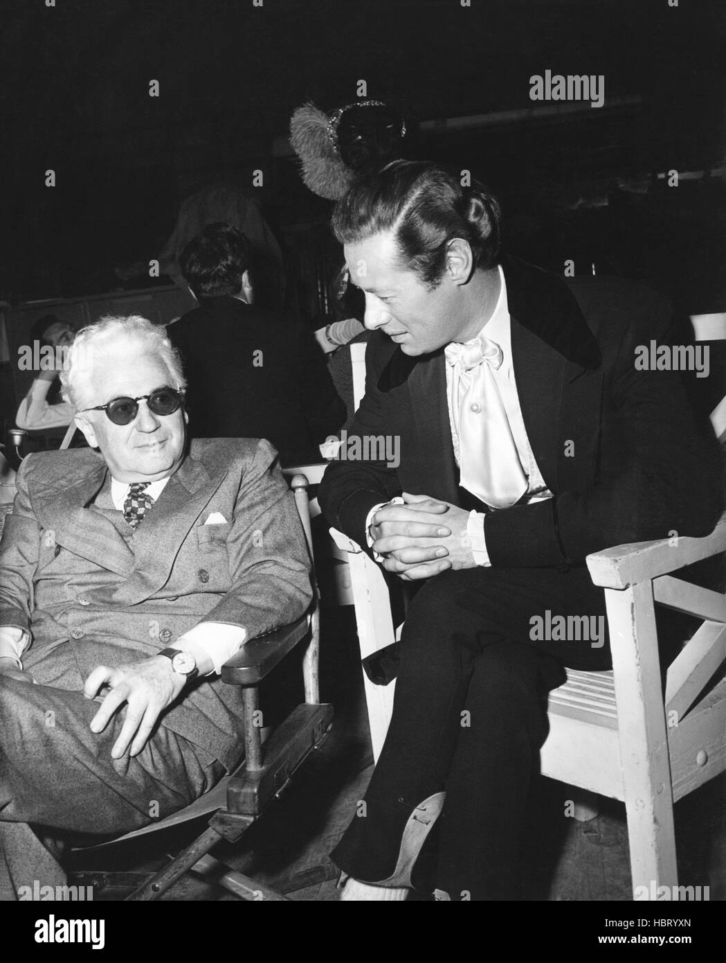 THE FOXES OF HARROW, from left, director John Stahl, Rex Harrison, on ...