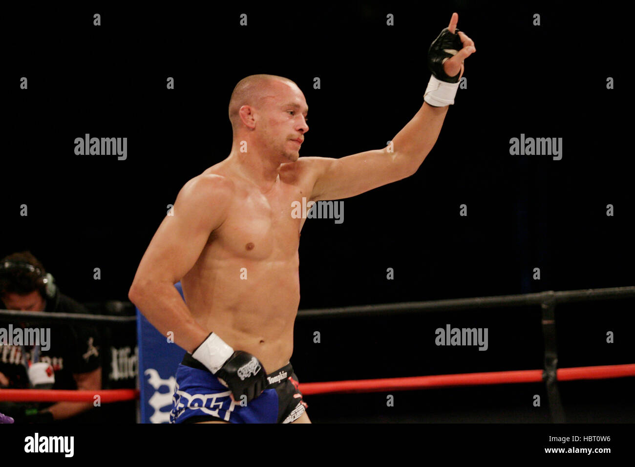 Mark Hominick celebrates his victory over Savant Young at Affliction's ...
