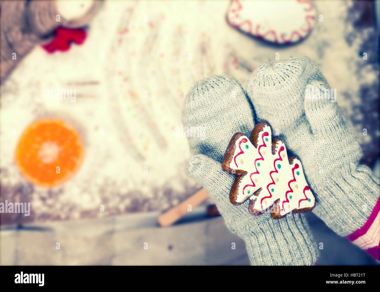 Child hands in gloves holding gingerbread cookie - Vintage Christmas ...