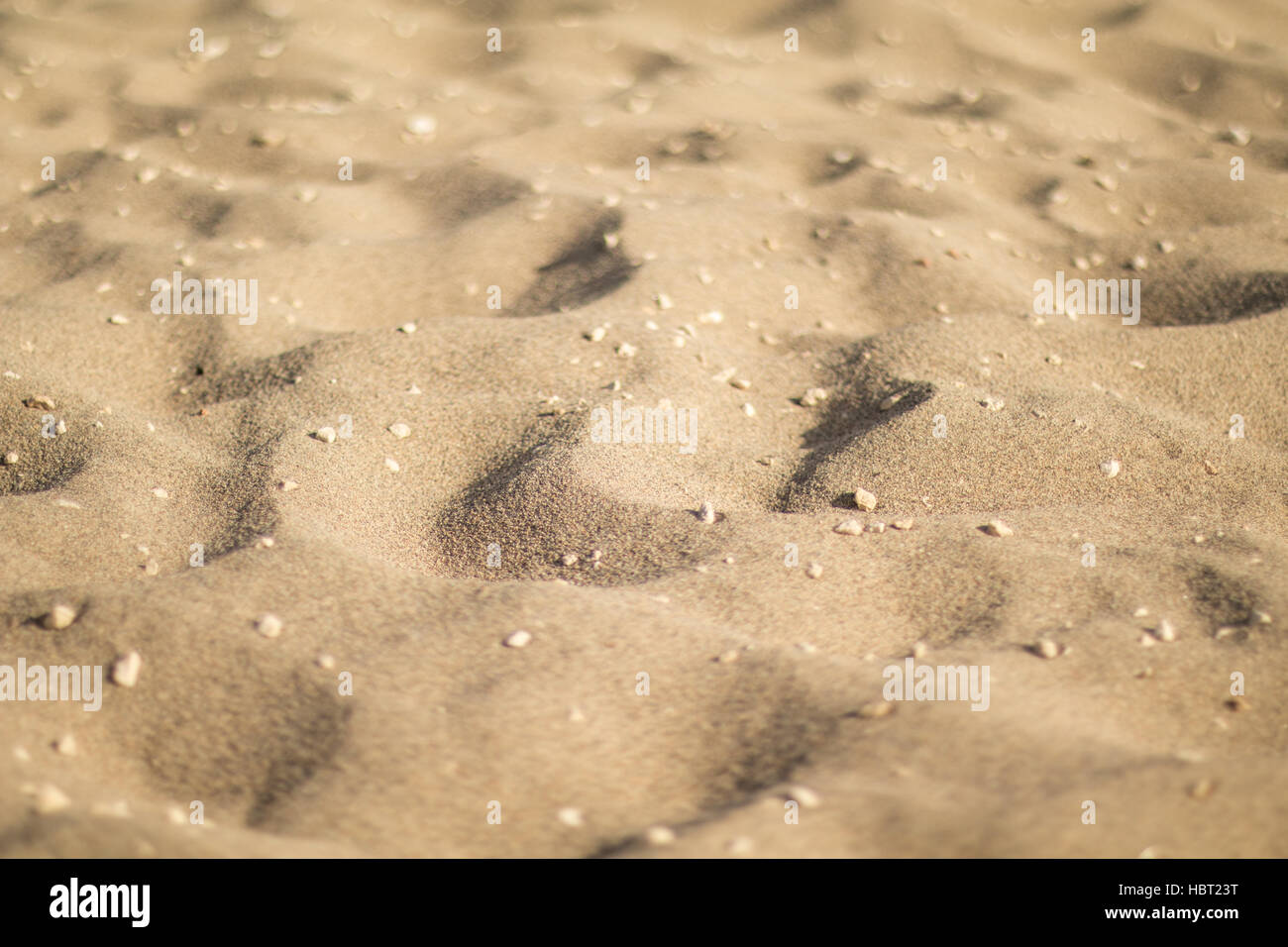 Sand dunes with pebbles, low angle Stock Photo - Alamy