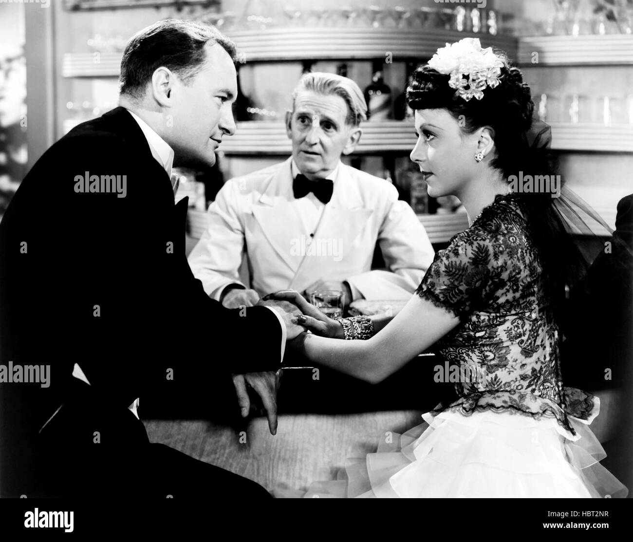 THE GAY FALCON, from left, George Sanders, Jimmy Conlin, Nina Vale ...