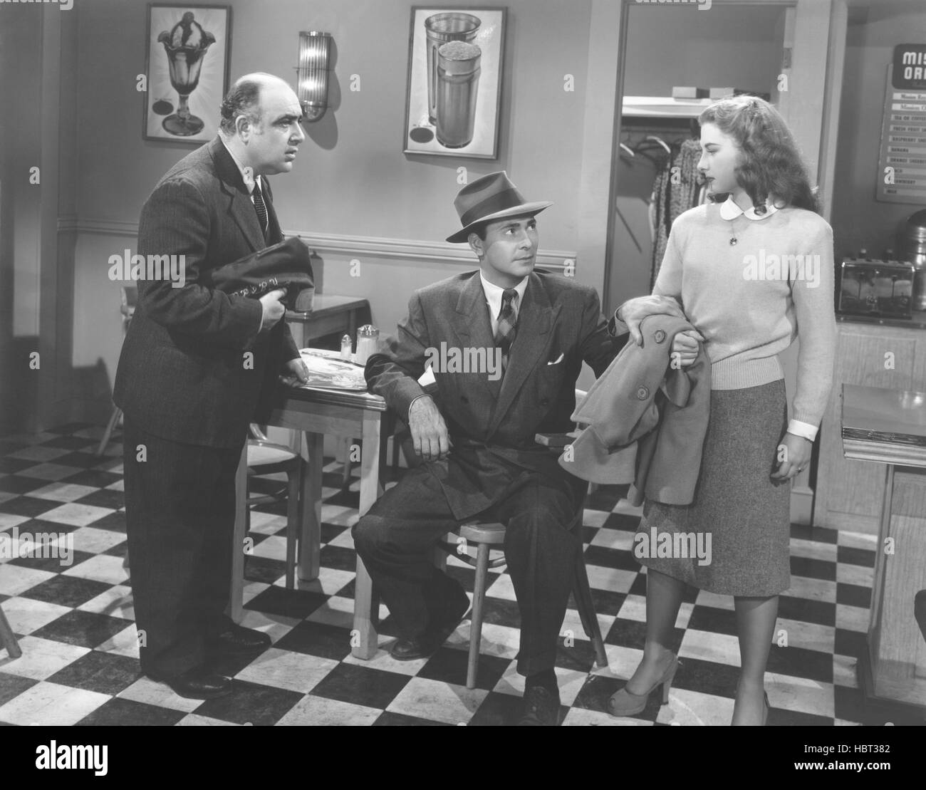 THE GANGSTER, from left: Akim Tamiroff, Barry Sullivan, Joan Loring ...