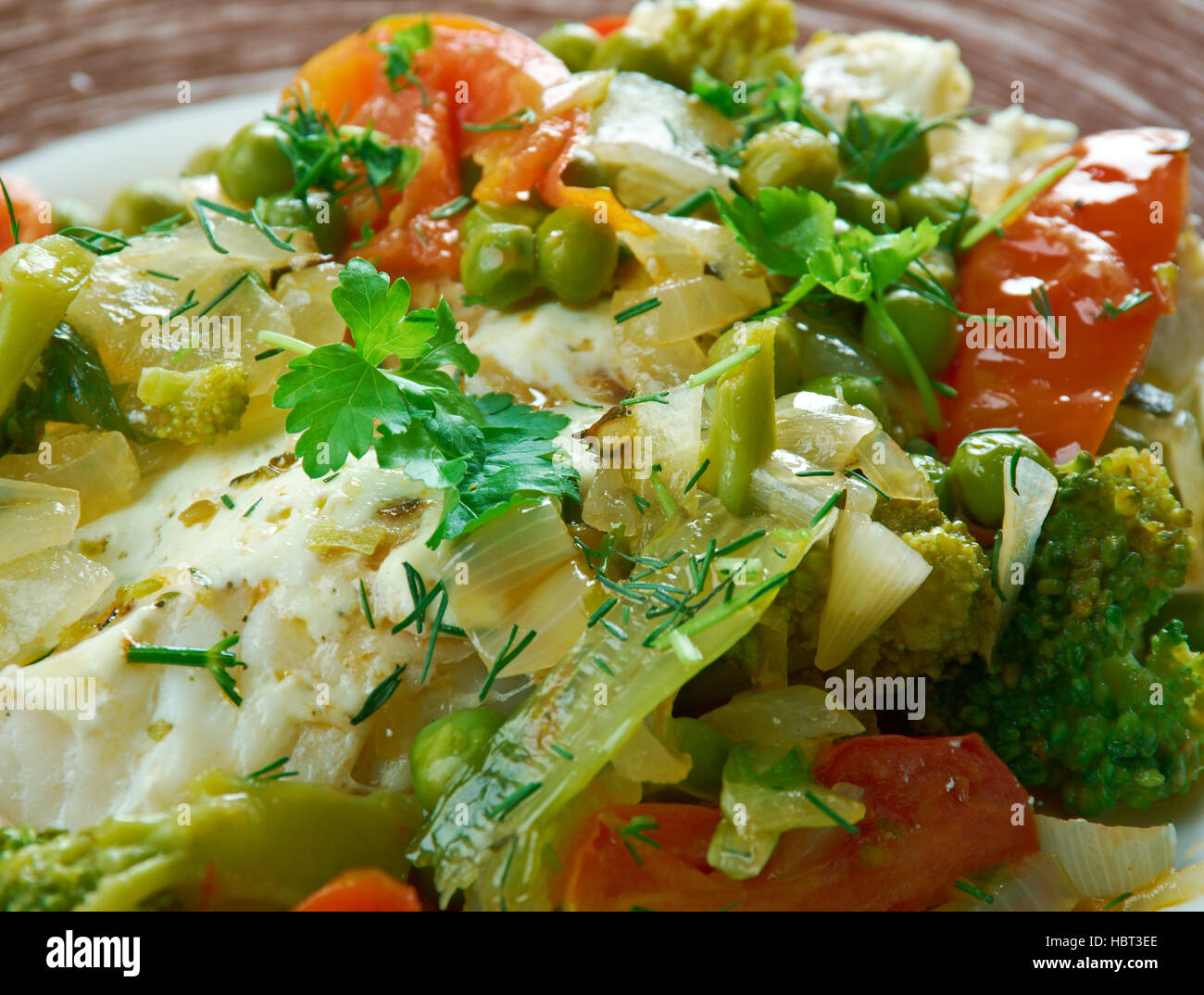 Baked Cod Provencal.French seafood dish Stock Photo - Alamy
