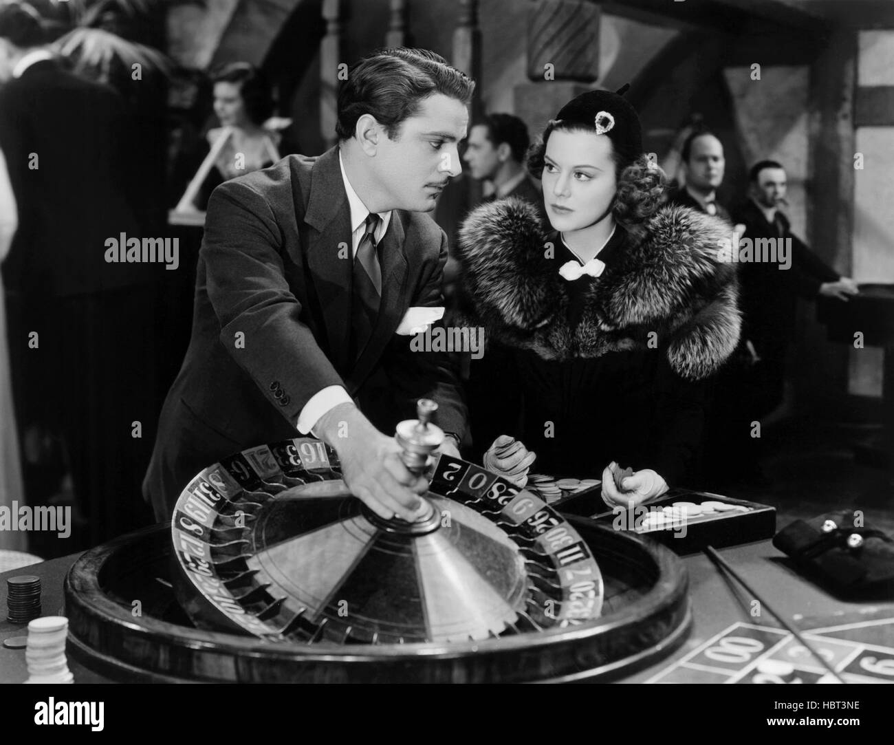 GAMBLING SHIP, from left: Robert Wilcox, Helen Mack, 1938 Stock Photo ...
