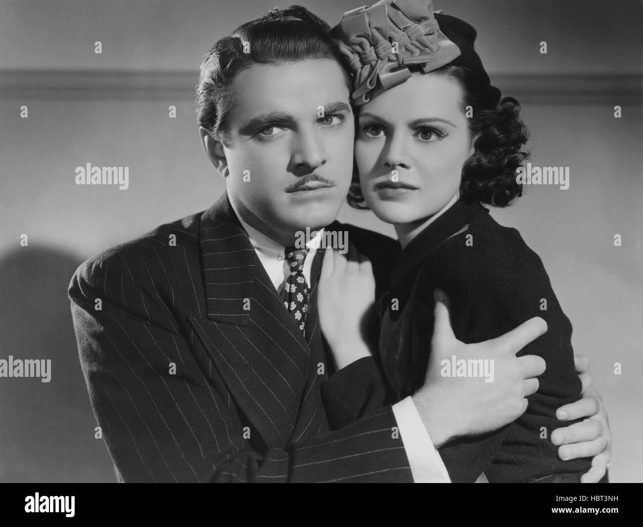GAMBLING SHIP, from left: Robert Wilcox, Helen Mack, 1938 Stock Photo ...