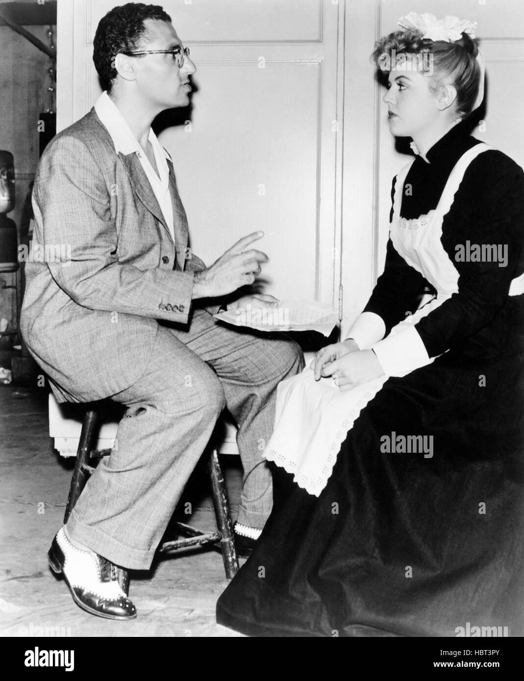 GASLIGHT, from left: director George Cukor, Angela Lansbury on set ...