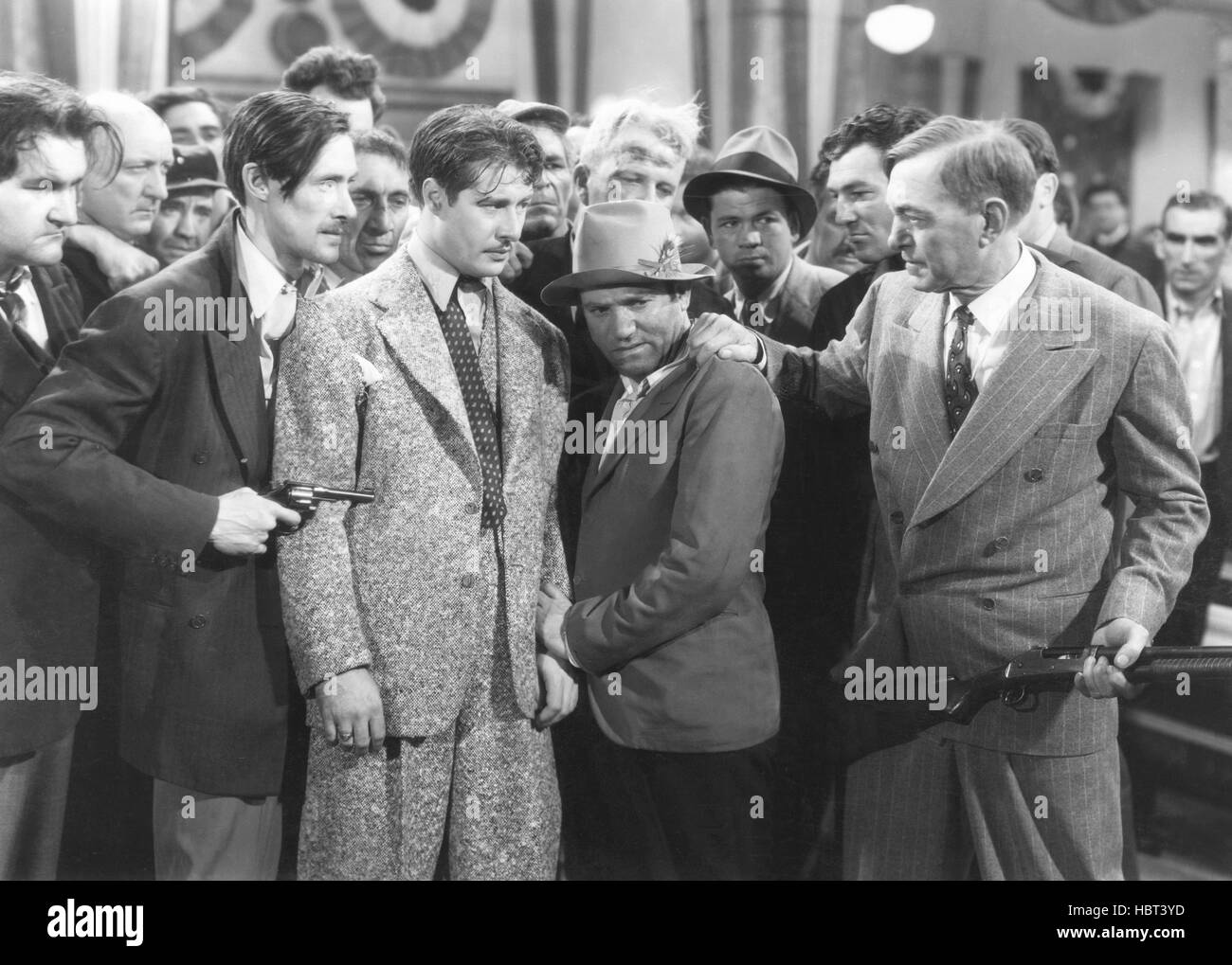 GATEWAY, from left: John Carradine (gun), Don Ameche, Eddie Conrad ...