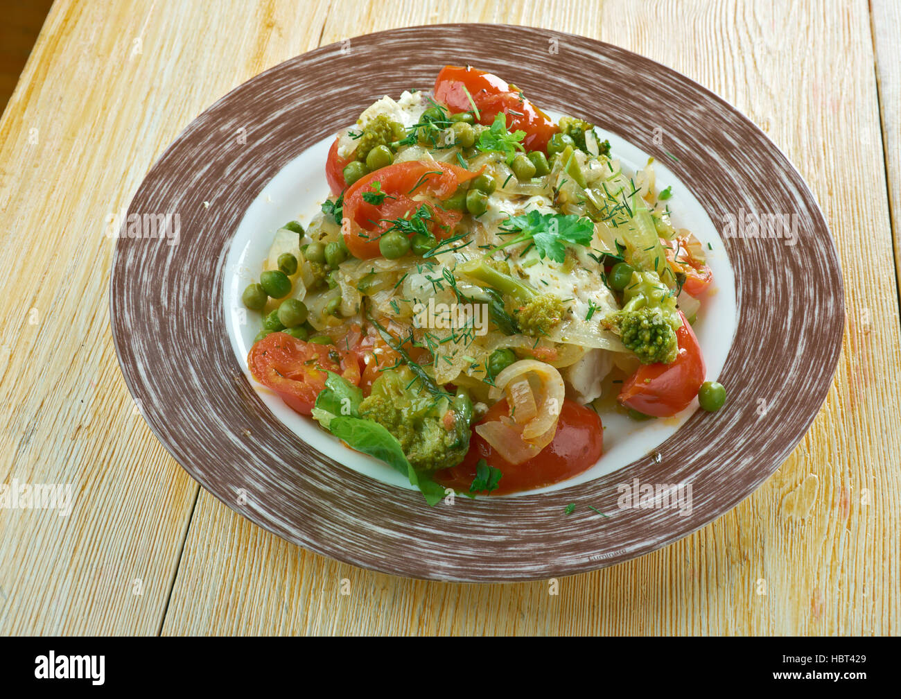 Baked Cod Provencal.French seafood dish Stock Photo - Alamy