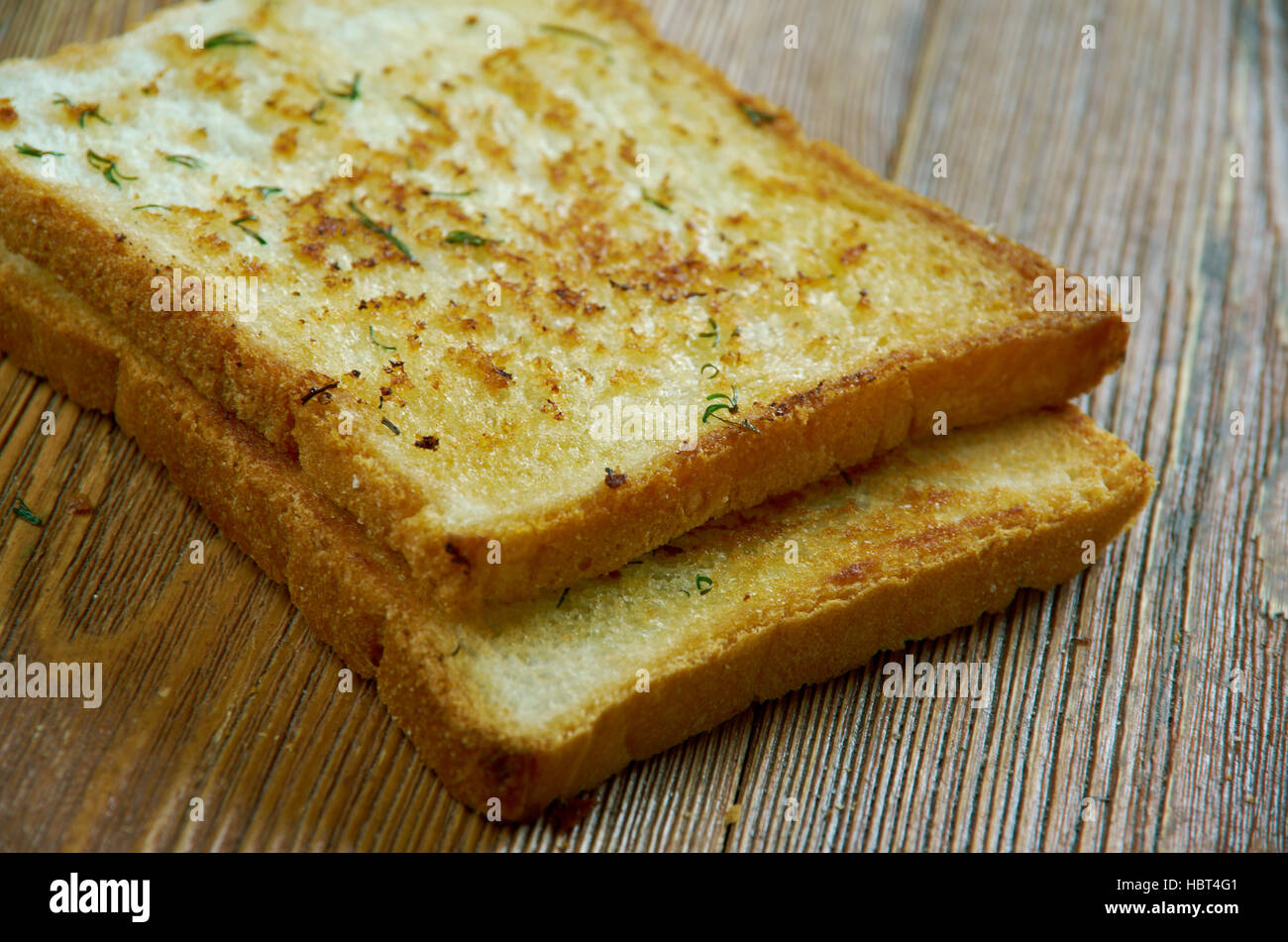 Texas toast toast itself is made by putting butter or margarine on both ...