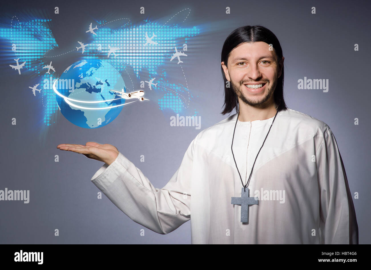 Young christian priest in air travel concept Stock Photo - Alamy
